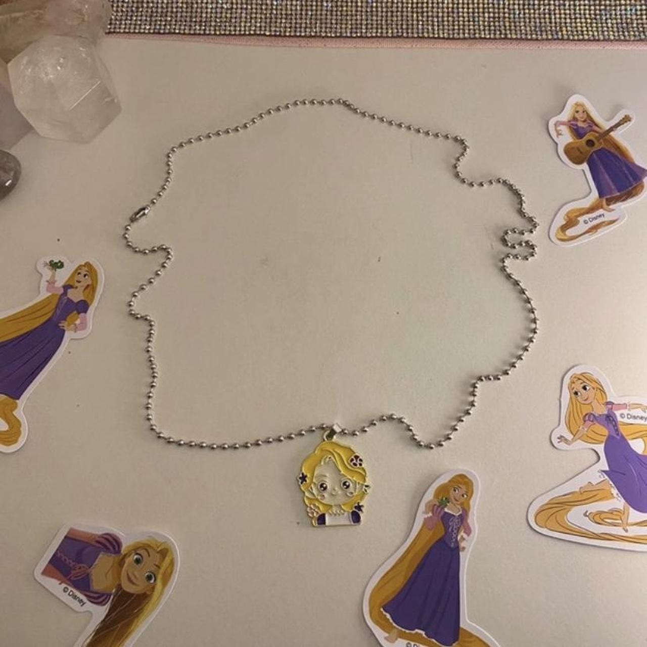 Tangled Rapunzel Disney Necklace 👸🏼🦎💜 , Brand New In... - Depop