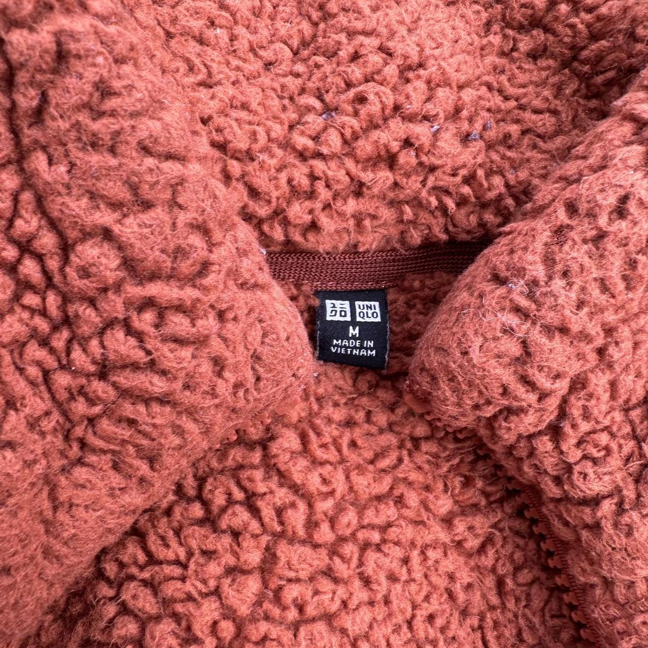 Uniqlo orange fuzzy zip up jacket Lil matting Size m - Depop
