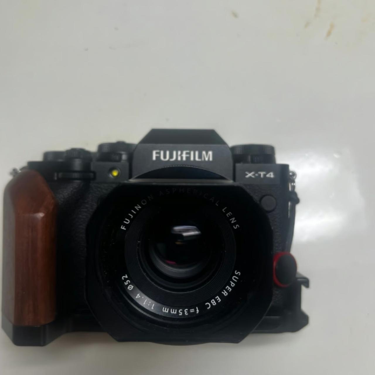 Like new Fujifilm XT4 with 35mm Fuji lens, battery... - Depop