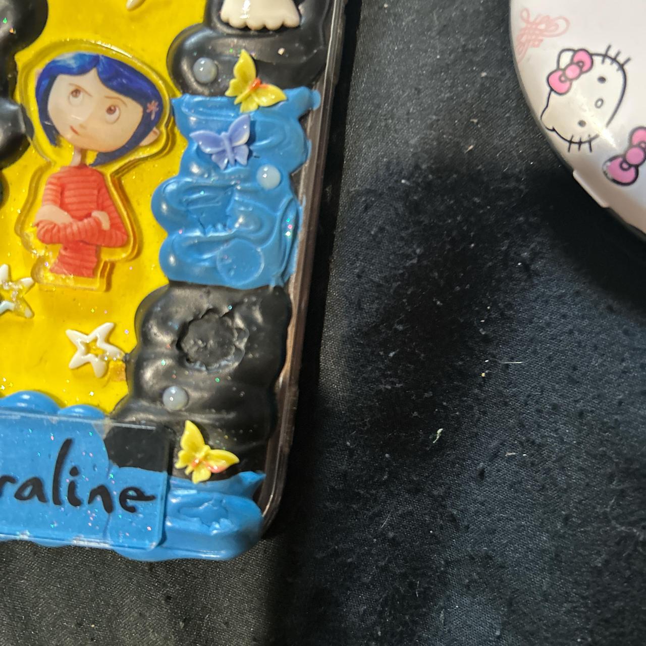 Handmade Coraline phone case with blue and black... | Depop