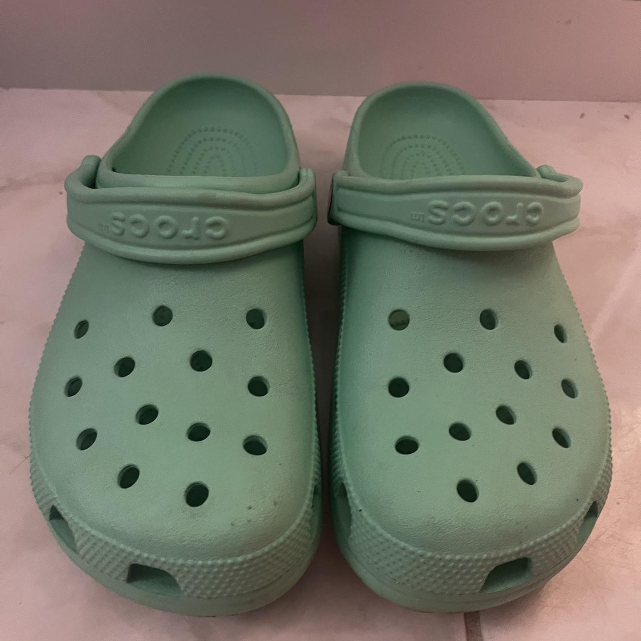 Mint green crocs- worn once. The green isn’t my... - Depop
