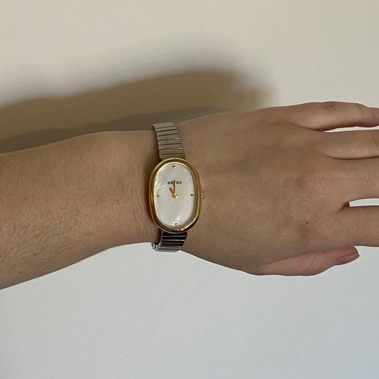 BREDA watch in white opal face and mixed metal ... | Depop