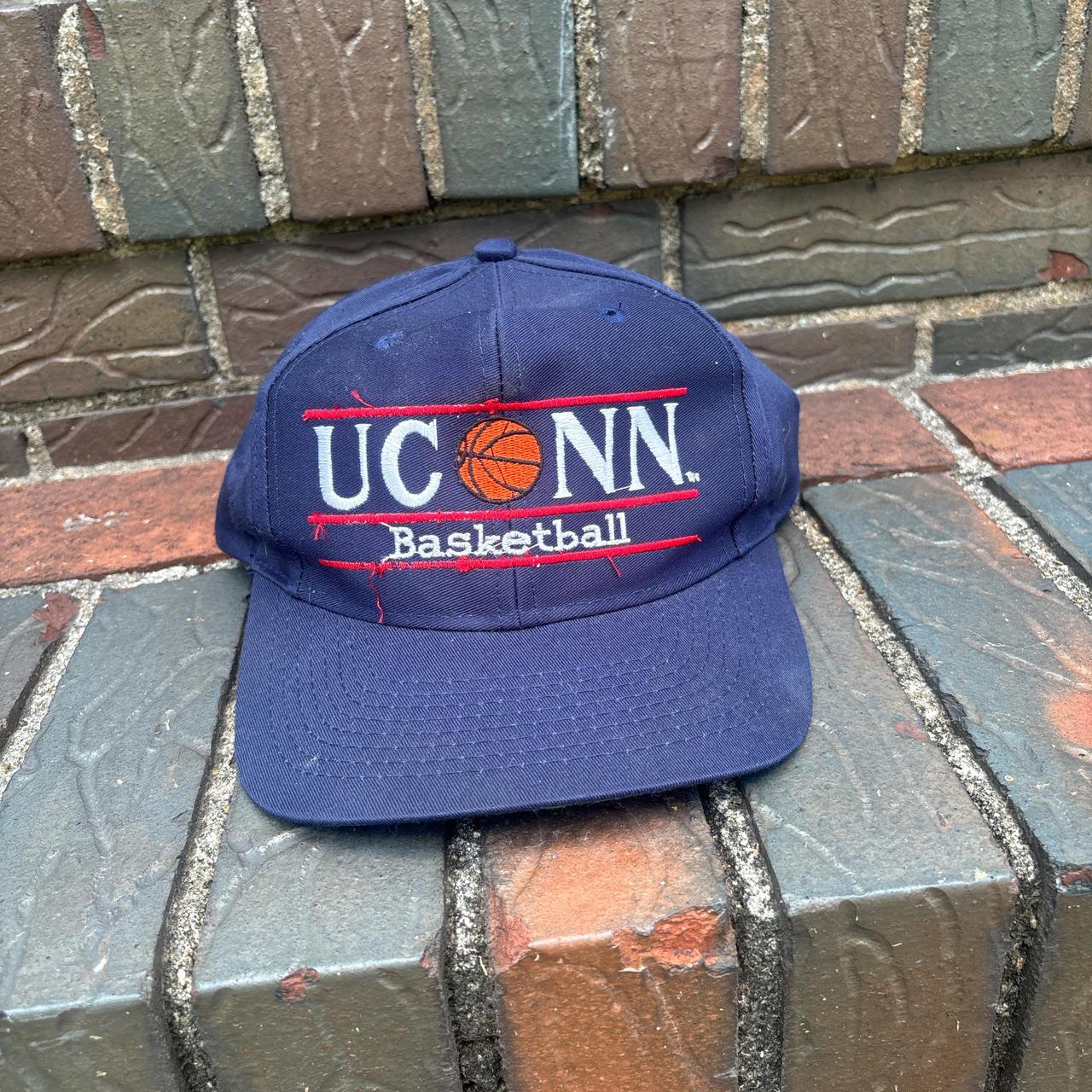 1990s UCONN Basketball navy and red snapback hat... - Depop