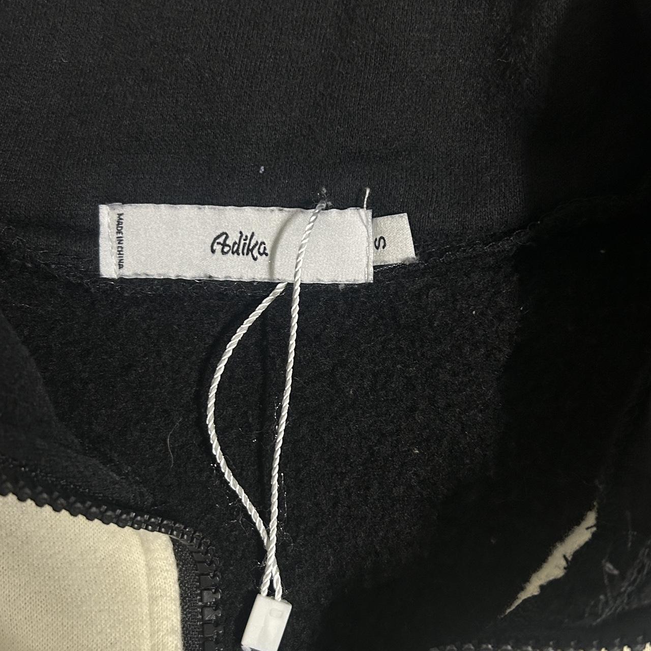 small Adika black and white/creme bomber racer... - Depop