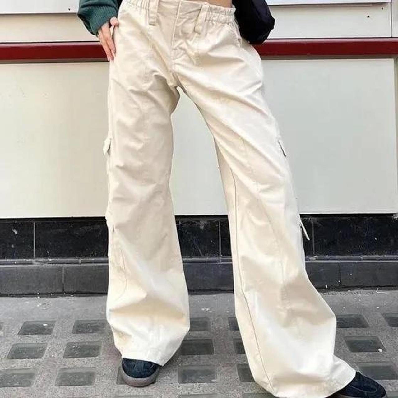 cream low waisted motel rocks cargo pants never worn - Depop