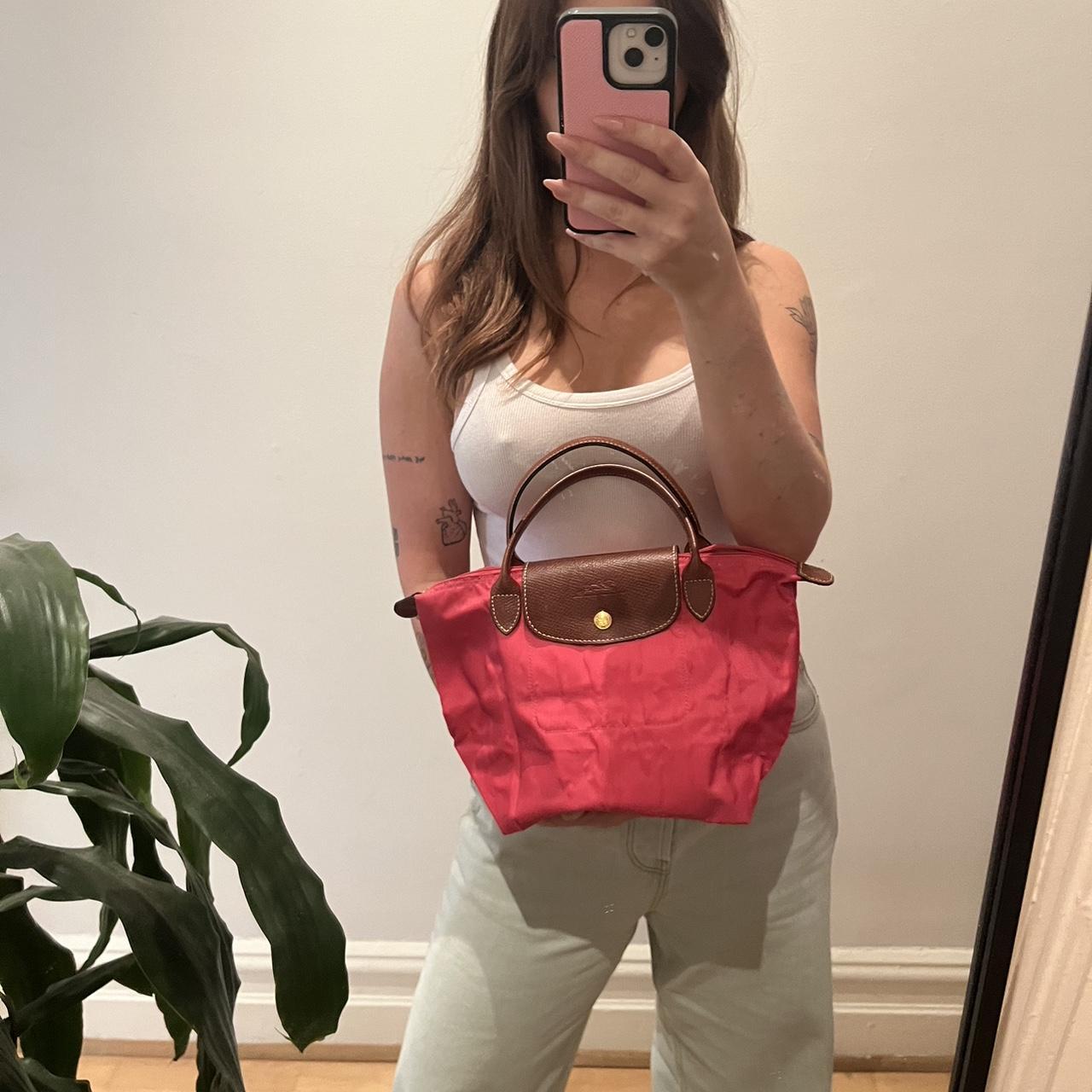 Longchamp hot pink le pliage small bag Some marks... | Depop