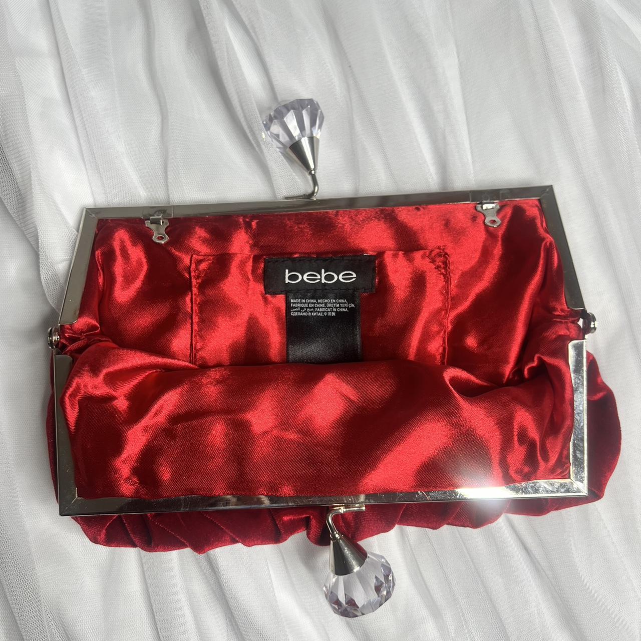 BEBE Red velvet clutch with a silver metal frame and... - Depop