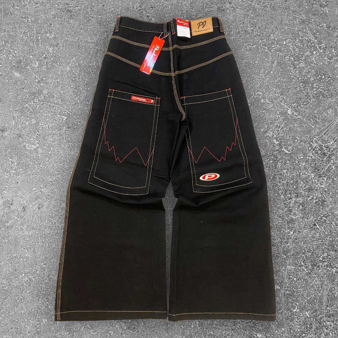 JNCO Men's Black and Red Jeans | Depop