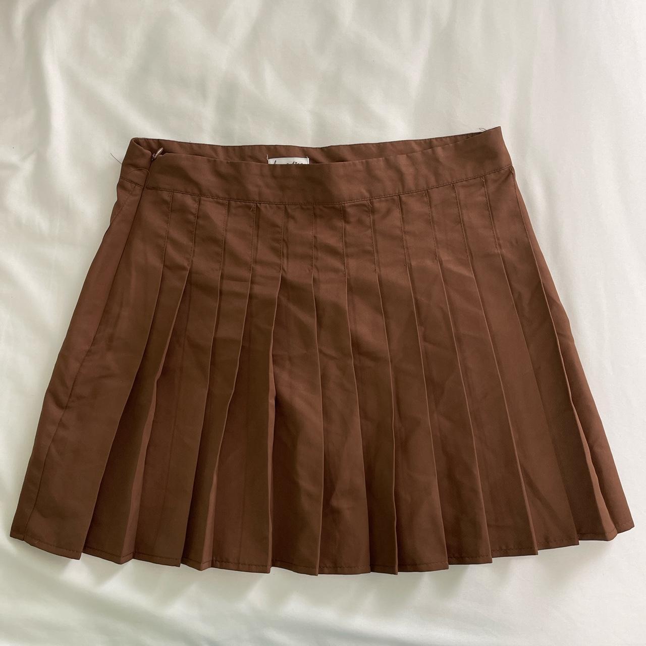 Cute brown pleated mini skirt in size M, can fit... - Depop