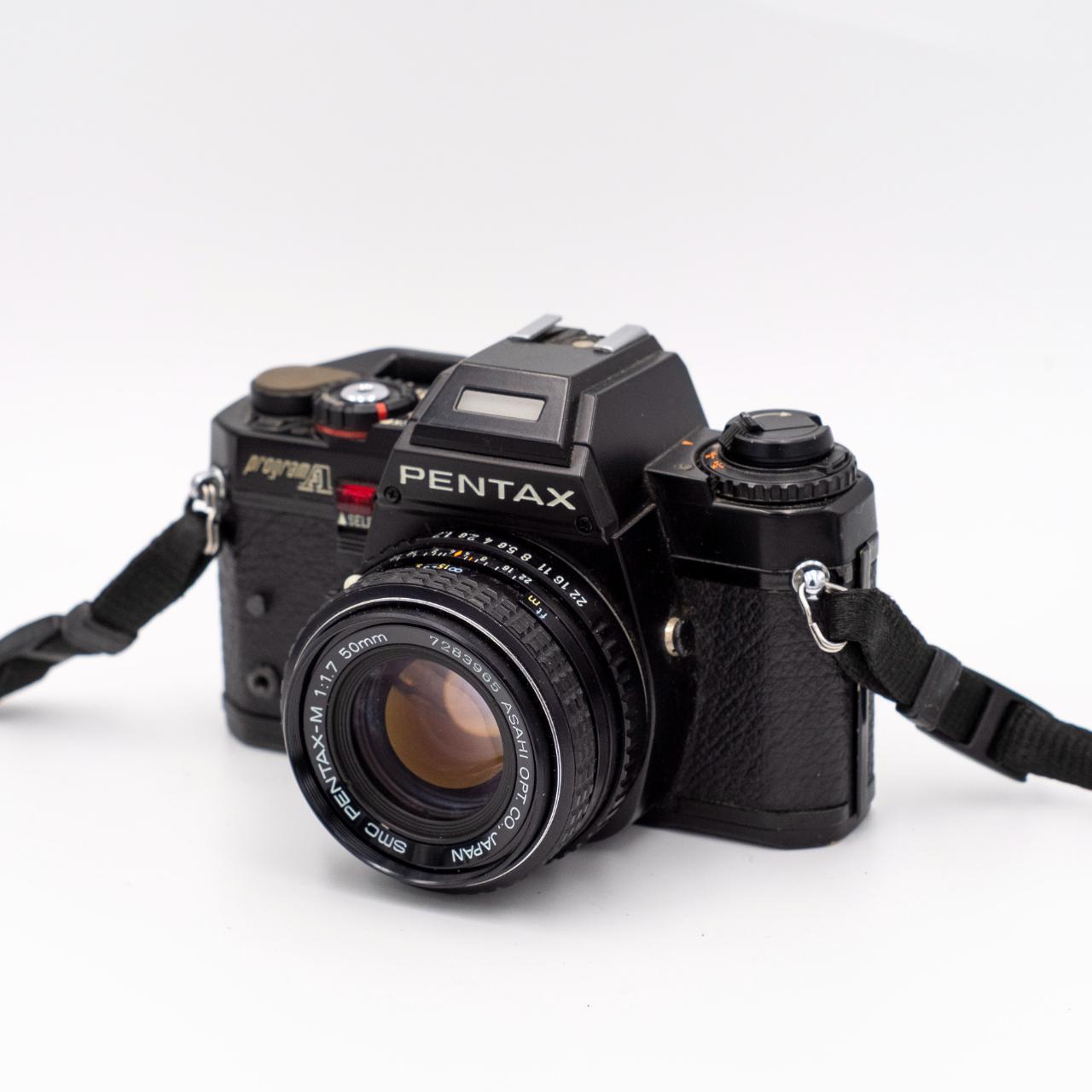 Nice mid 80s Pentax Program A 35mm film SLR with... - Depop