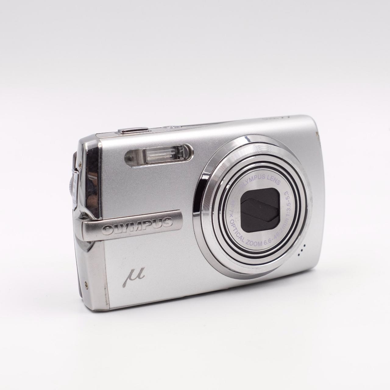 Late 2000s sleek silver ultracompact Olympus 10MP... - Depop