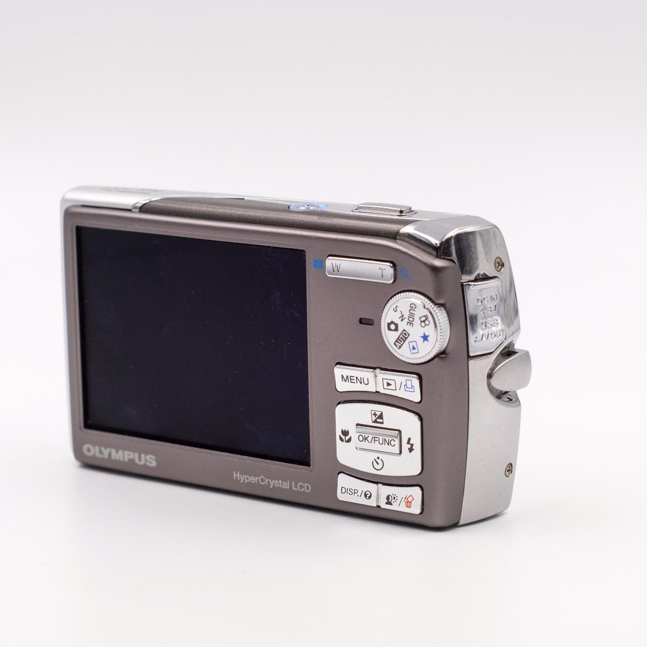 Late 2000s sleek silver ultracompact Olympus 10MP... - Depop