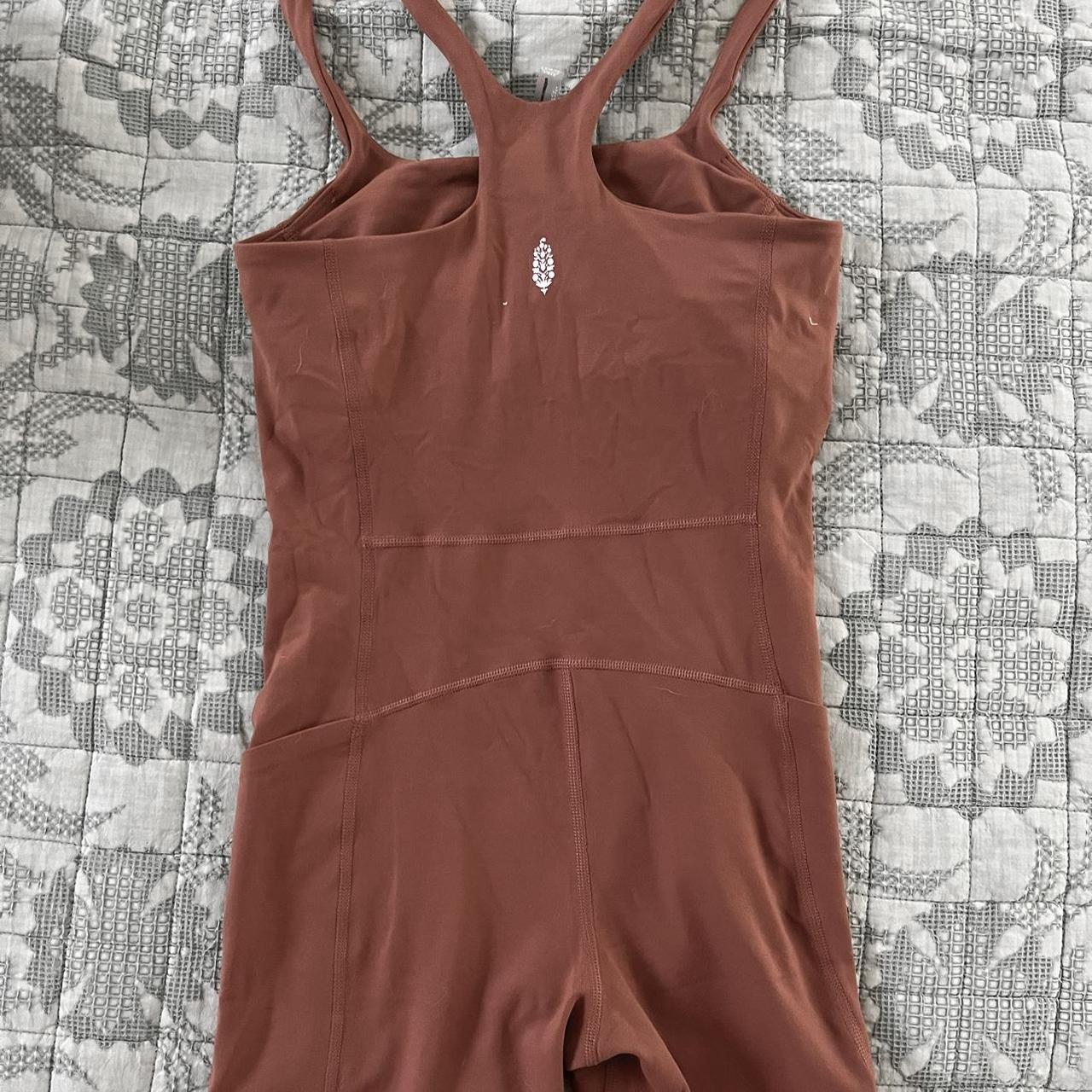 Free people movement onesie / runsie with a square... | Depop