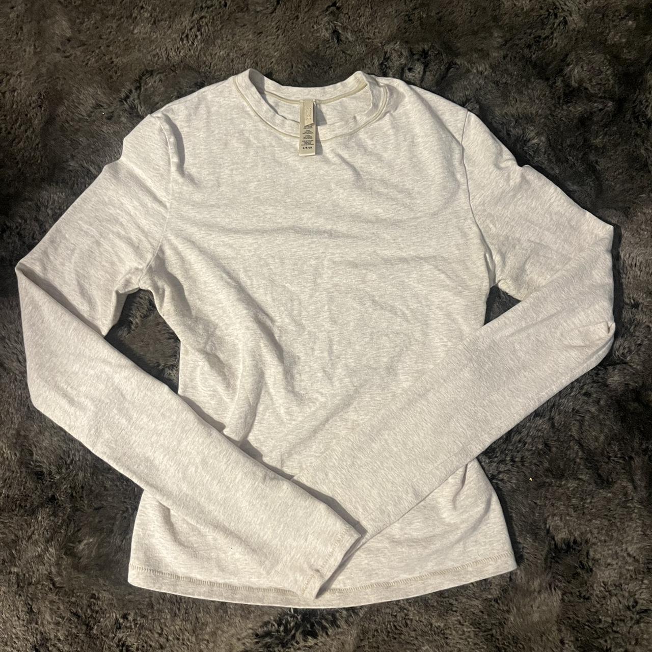 Skims cream top size small. Good condition - Depop