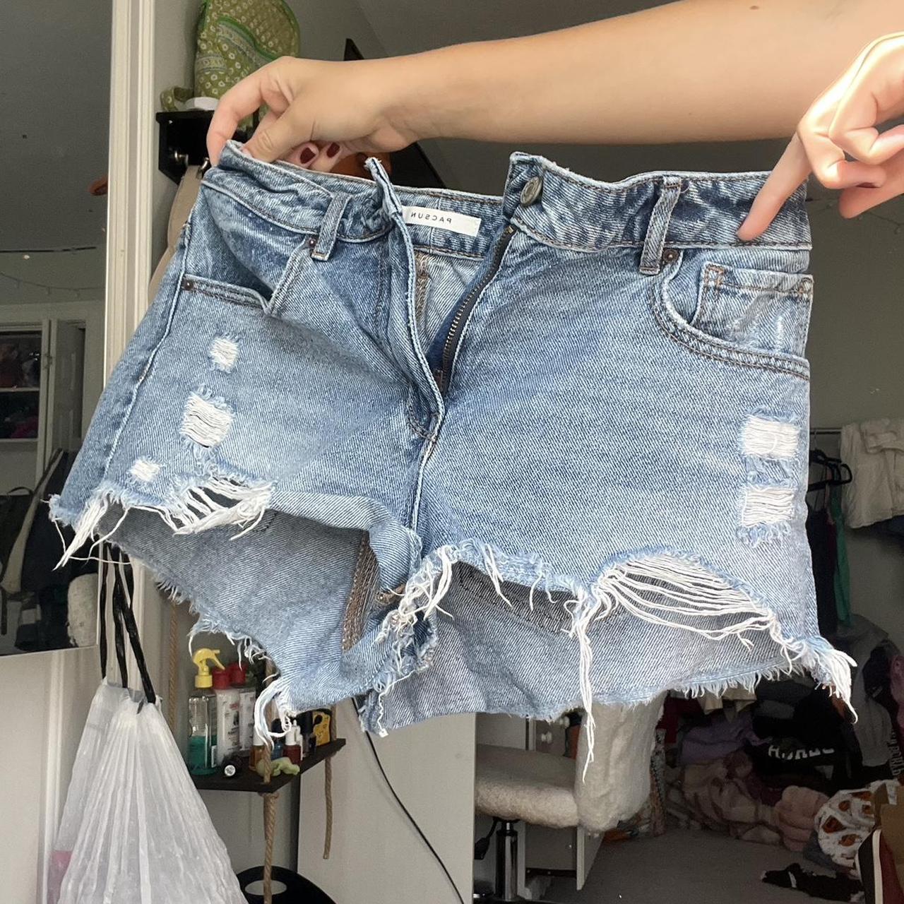 medium wash denim shorts with rips from pacsun -... - Depop