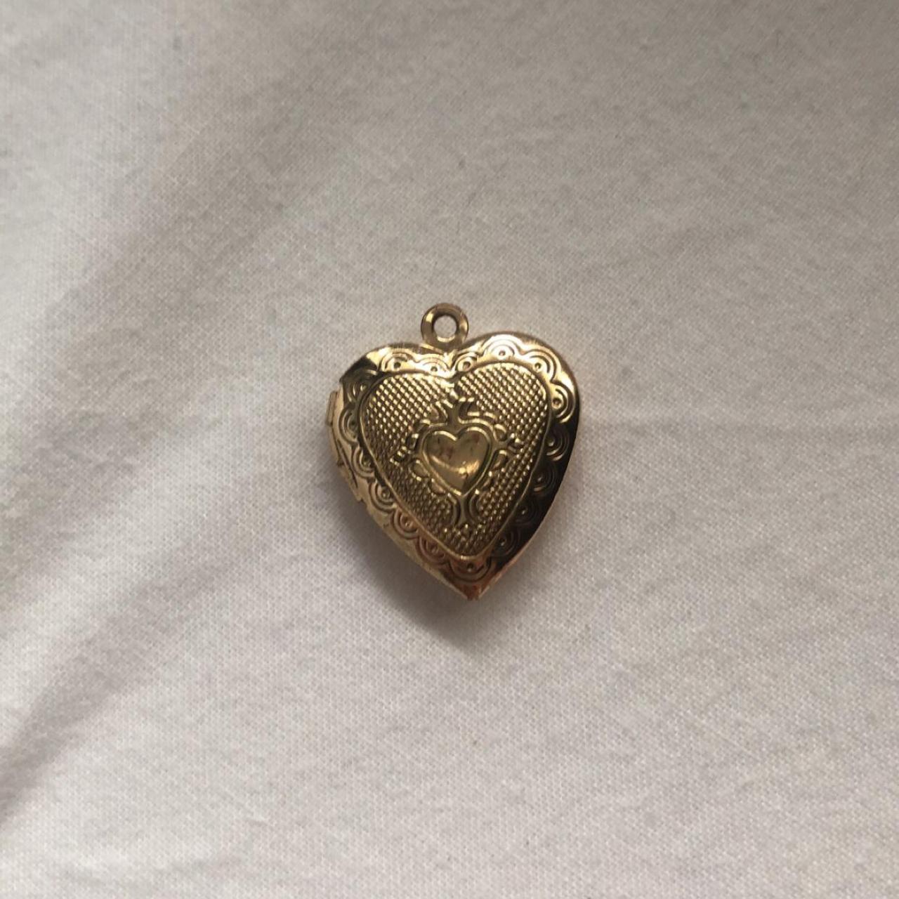 Golden locket no chain Slight wear still in great... - Depop