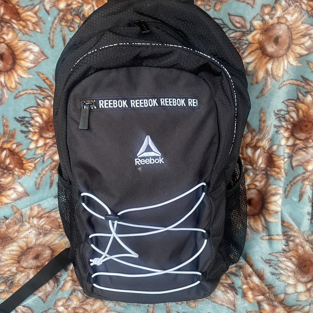 Black Reebok backpack with white stitching #backpack | Depop