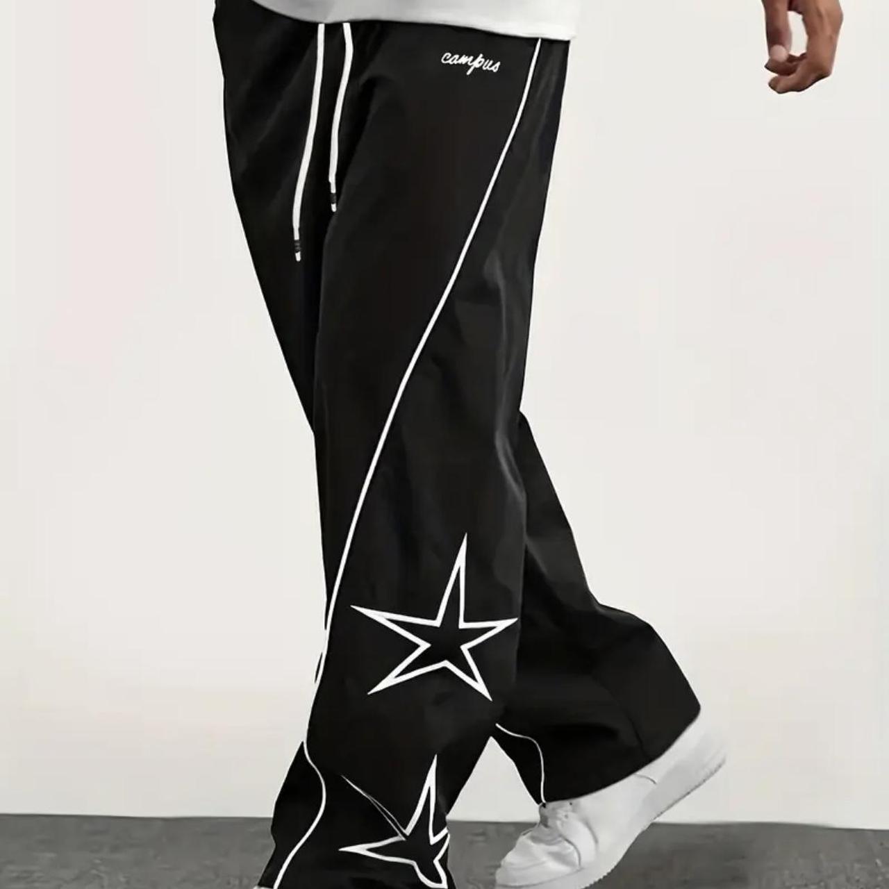 Campus black & white star tracksuit bottoms... | Depop