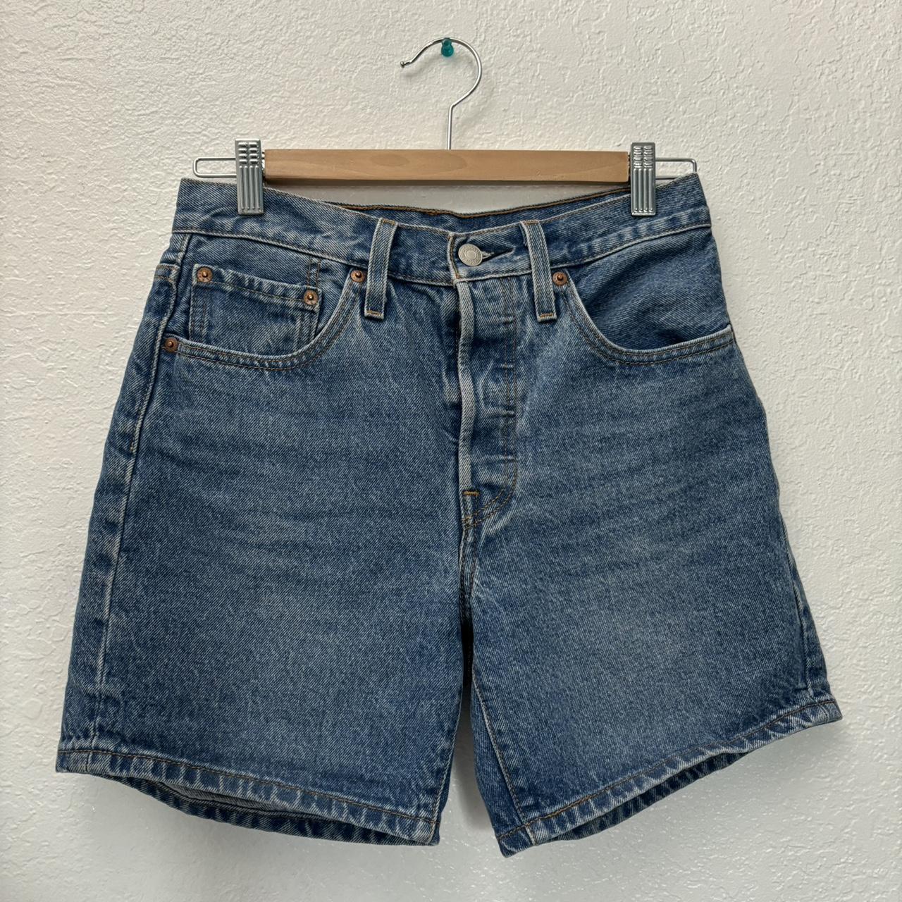 mid to high rise, mid length levi denim shorts, size... - Depop
