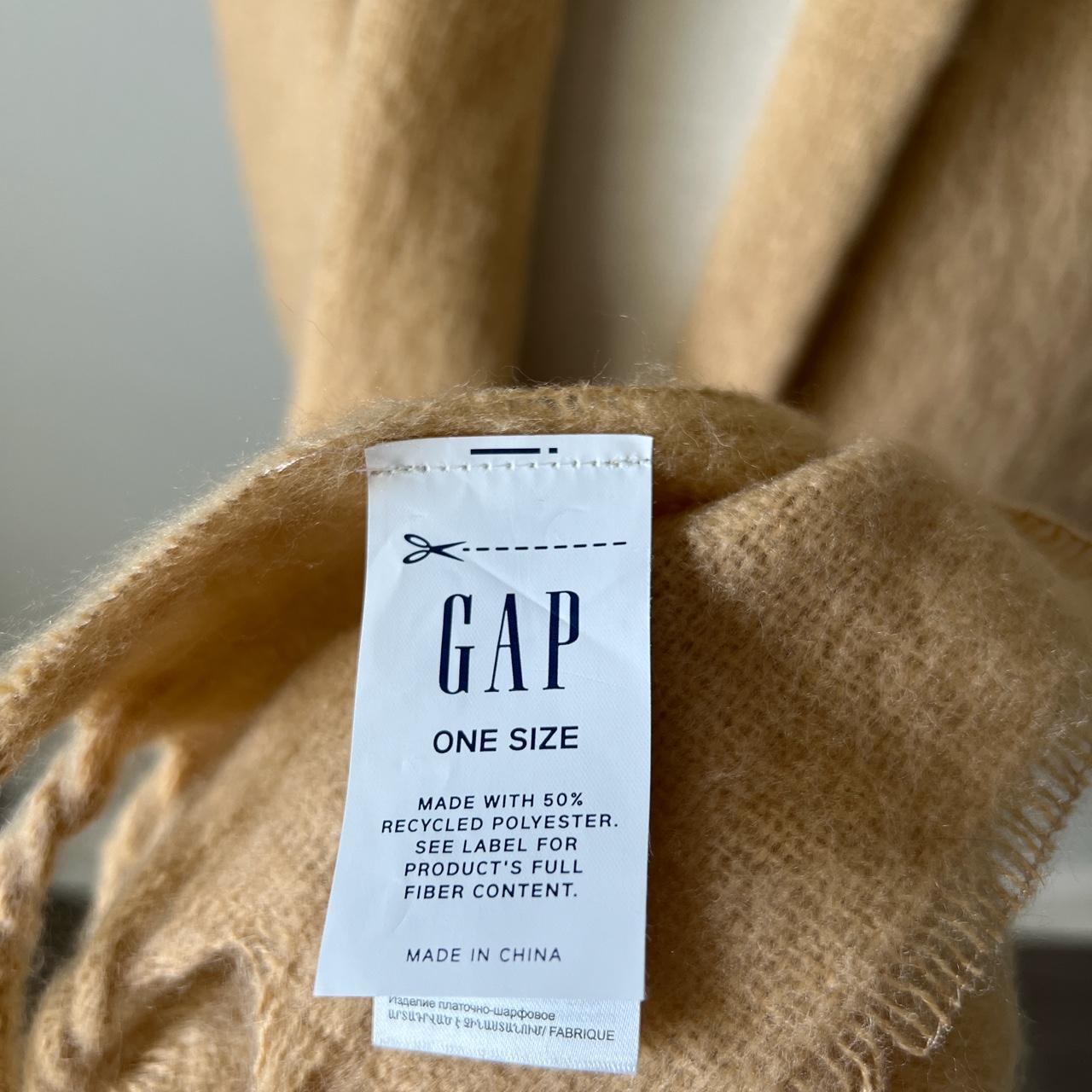 Fuzzy and cozy Gap scarf. A nice neutral camel color... - Depop