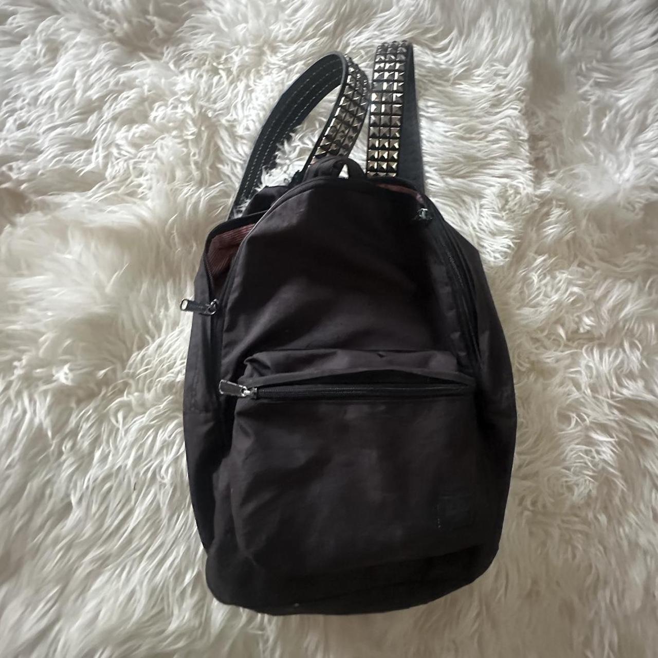Studded black backpack, distress and worn look... - Depop