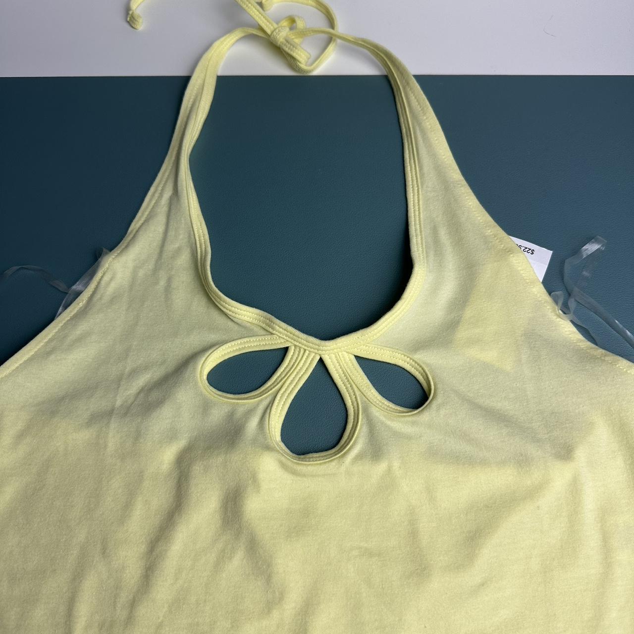 Yellow Halter Top with a cute cutout in the... - Depop