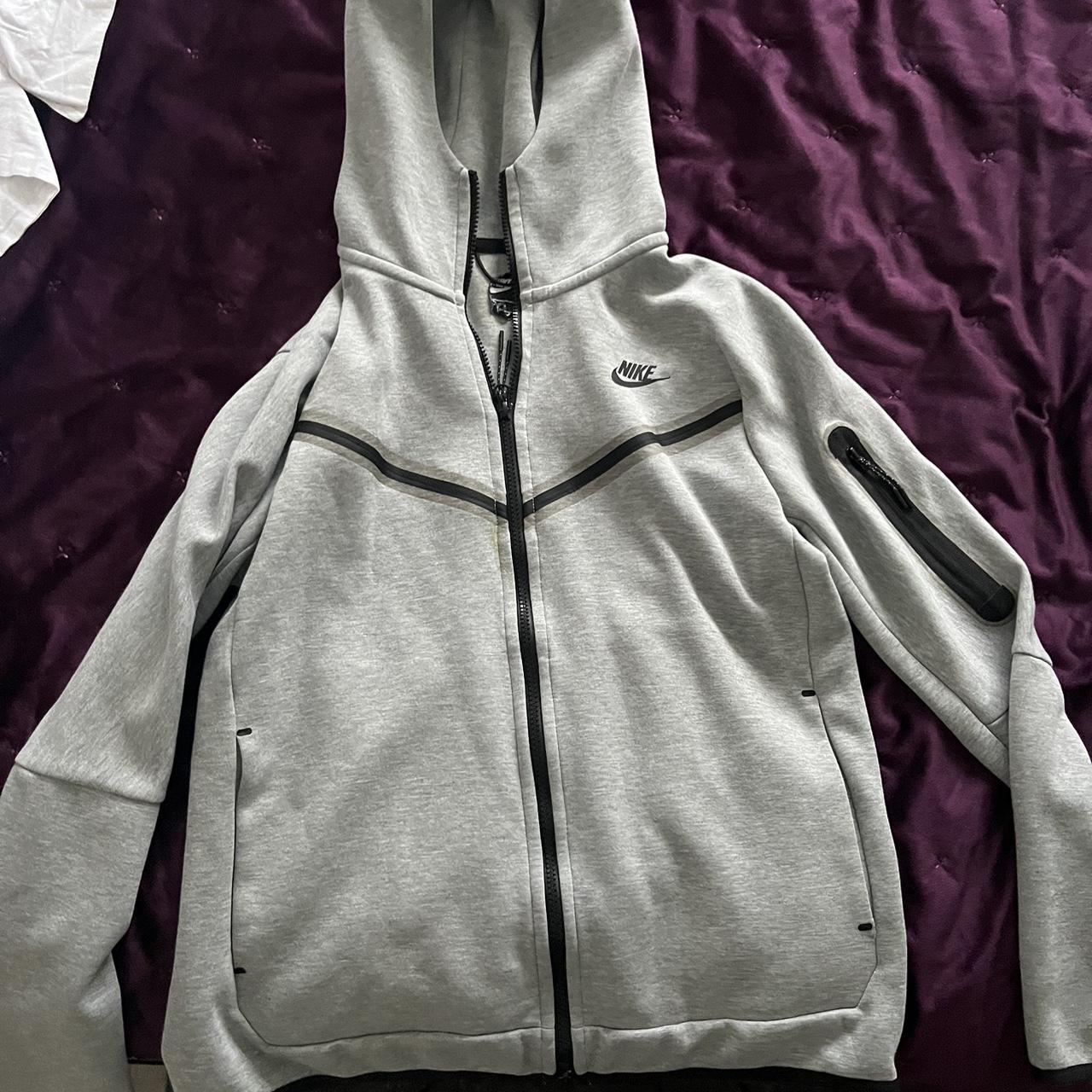 medium grey nike tech fleece worn out but no... - Depop
