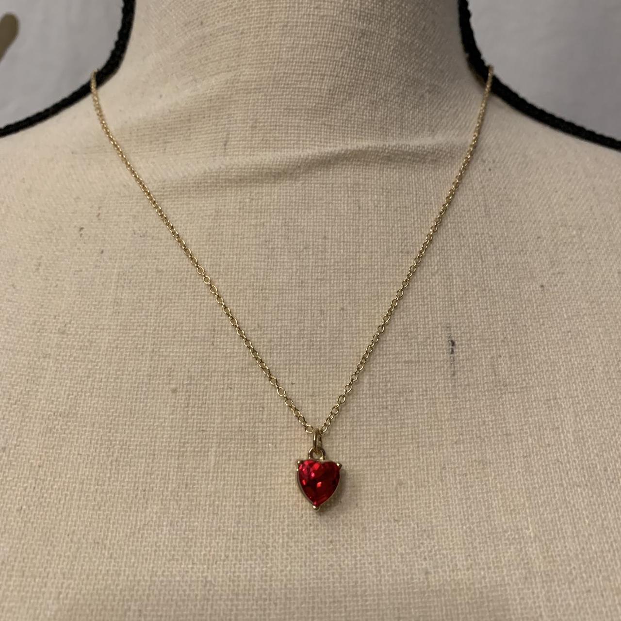 Super cute ruby red heart charm with gold chain. .... - Depop