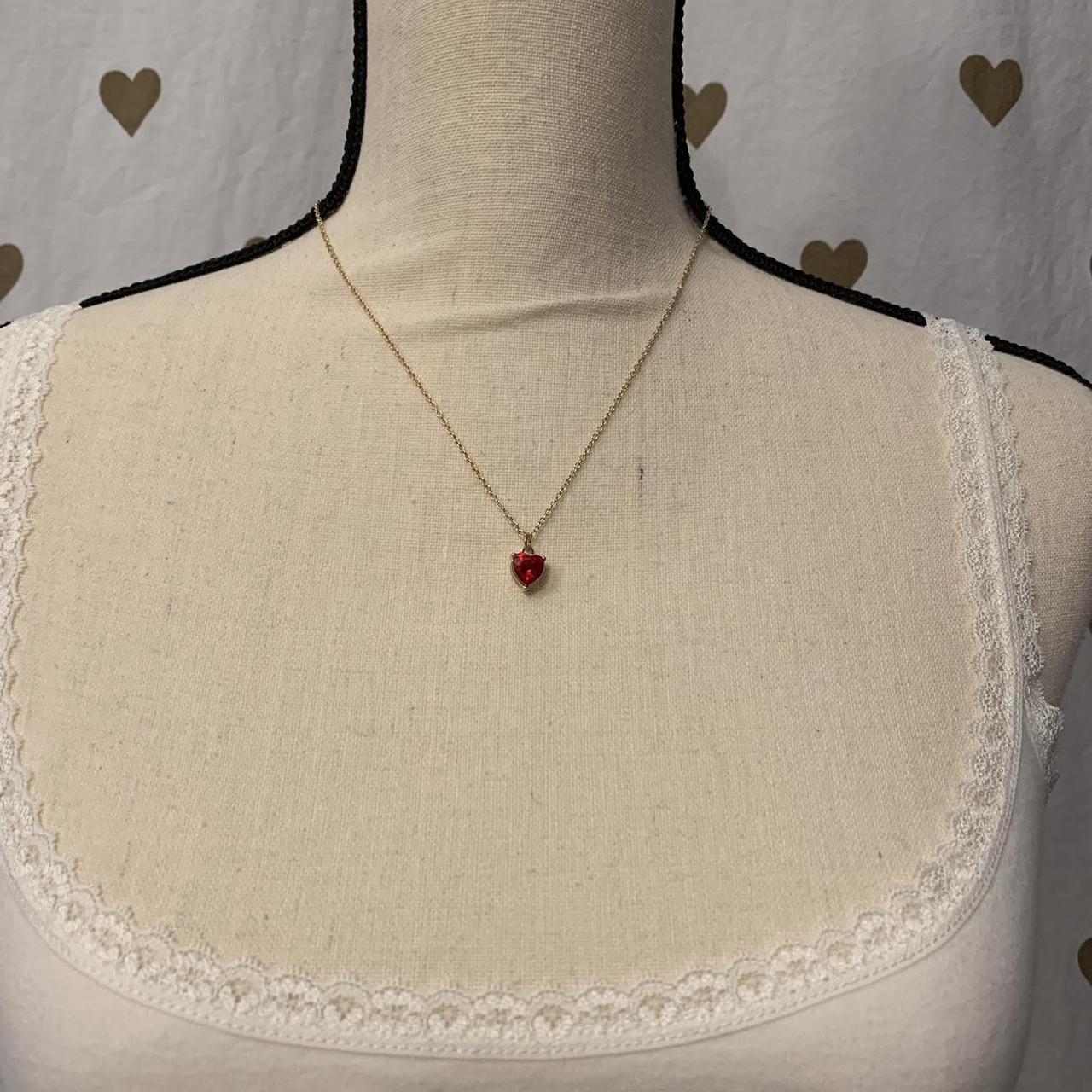 Super cute ruby red heart charm with gold chain. .... - Depop