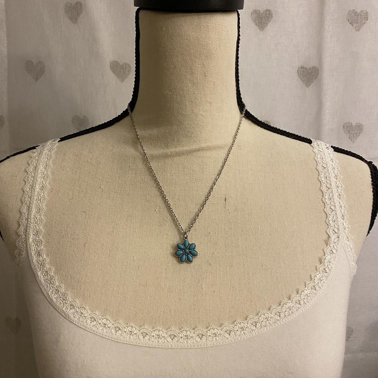 Beautiful sliver flower turquoisy charm on sliver... - Depop