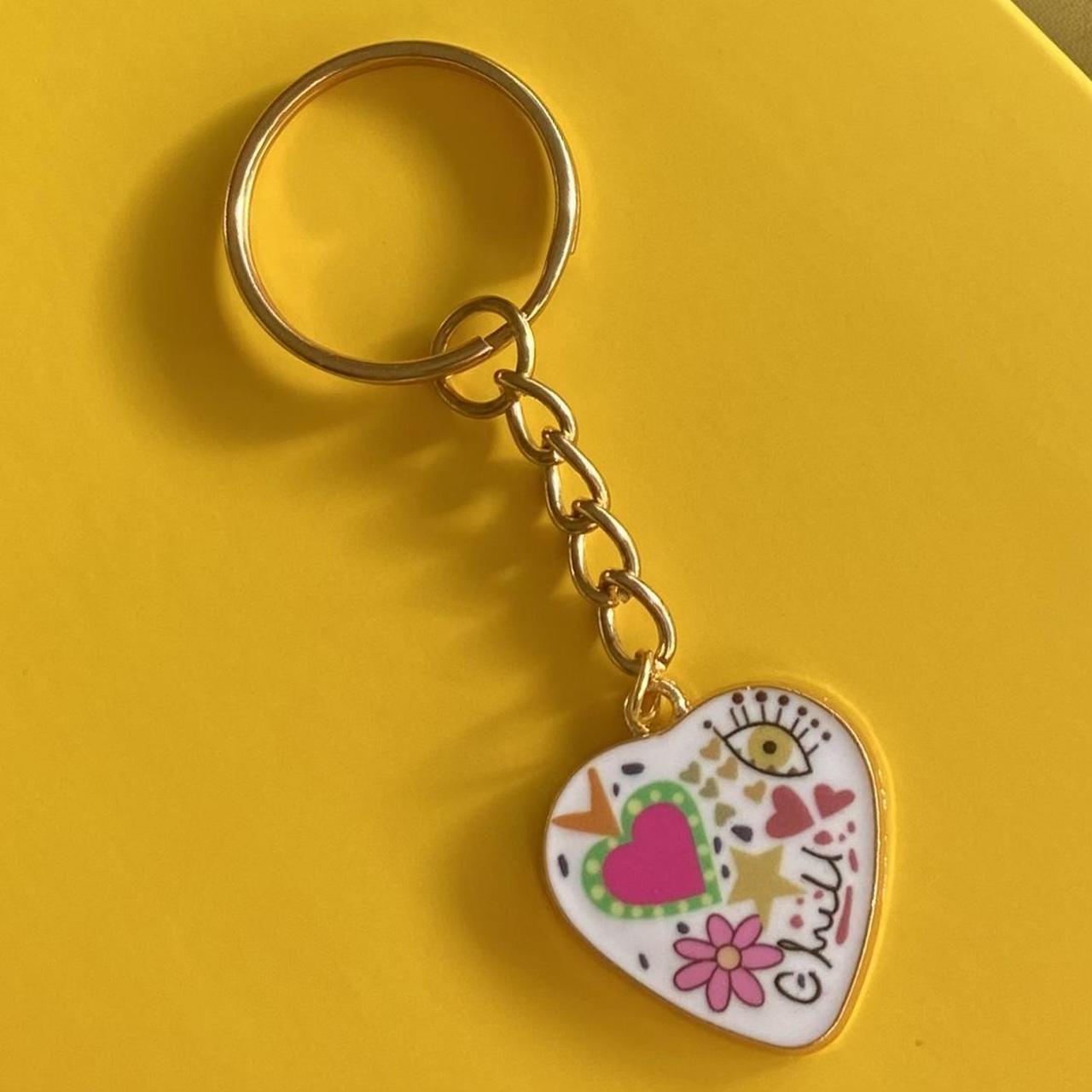 Gold plated funky heart keyring / keychain... - Depop