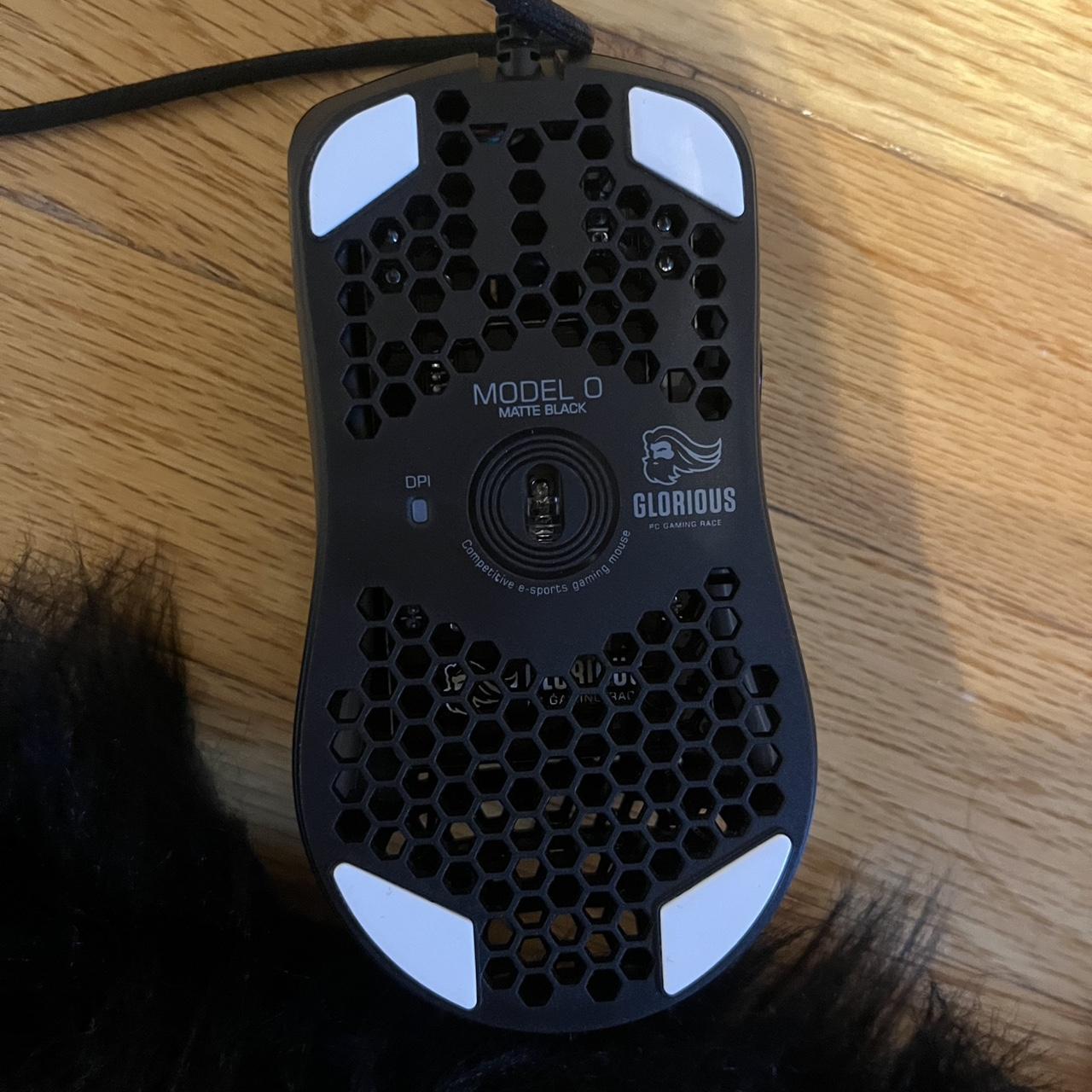 Black and white Glorious Model O mouse Has some... | Depop