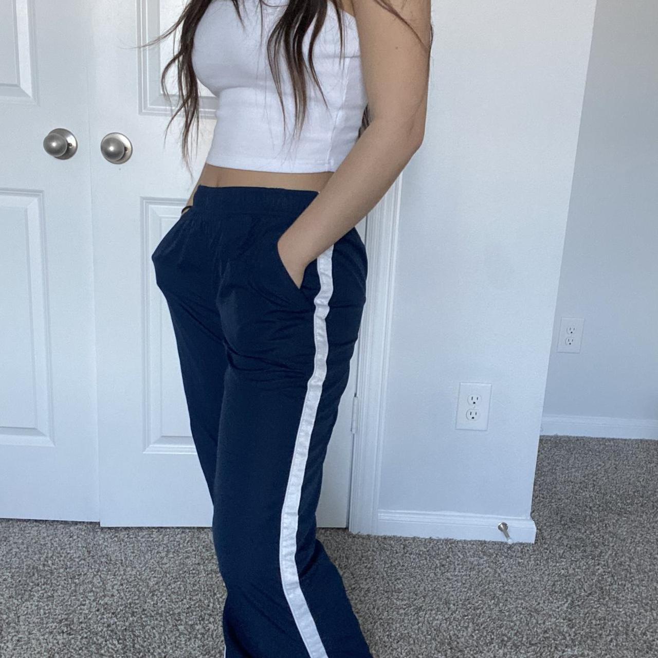 Super cute navy blue track pants! The zip halfway on... - Depop