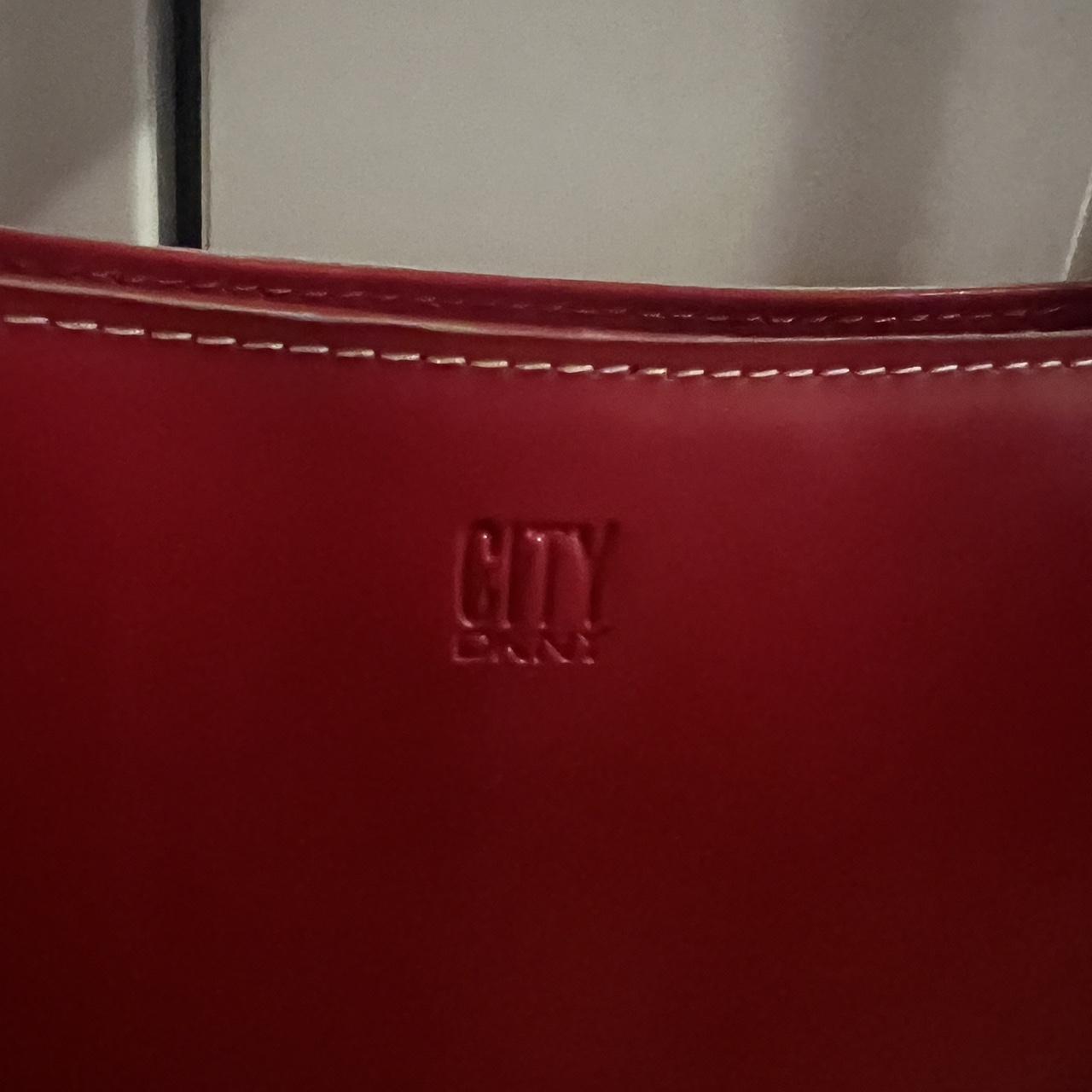 Cherry red DKNY purse. Trendy pop of color for fall... - Depop