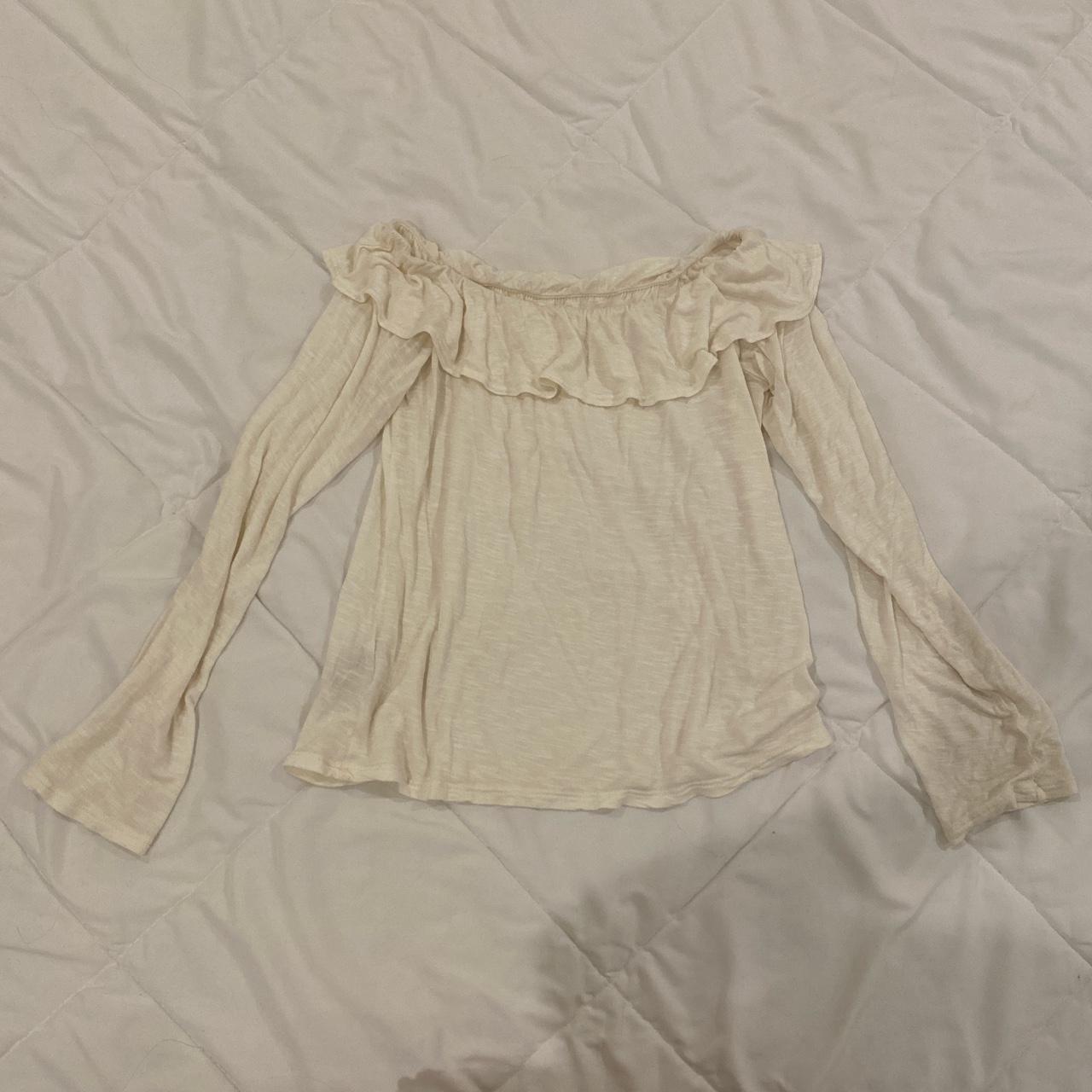 white long sleeve with ruffle detailing - fits size... - Depop