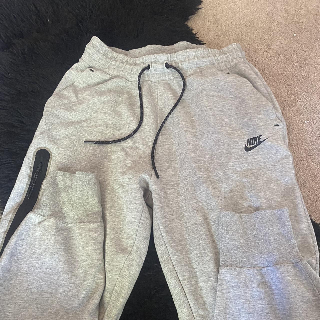 Nike grey tech fleece pants. Classic tech fleeces... - Depop
