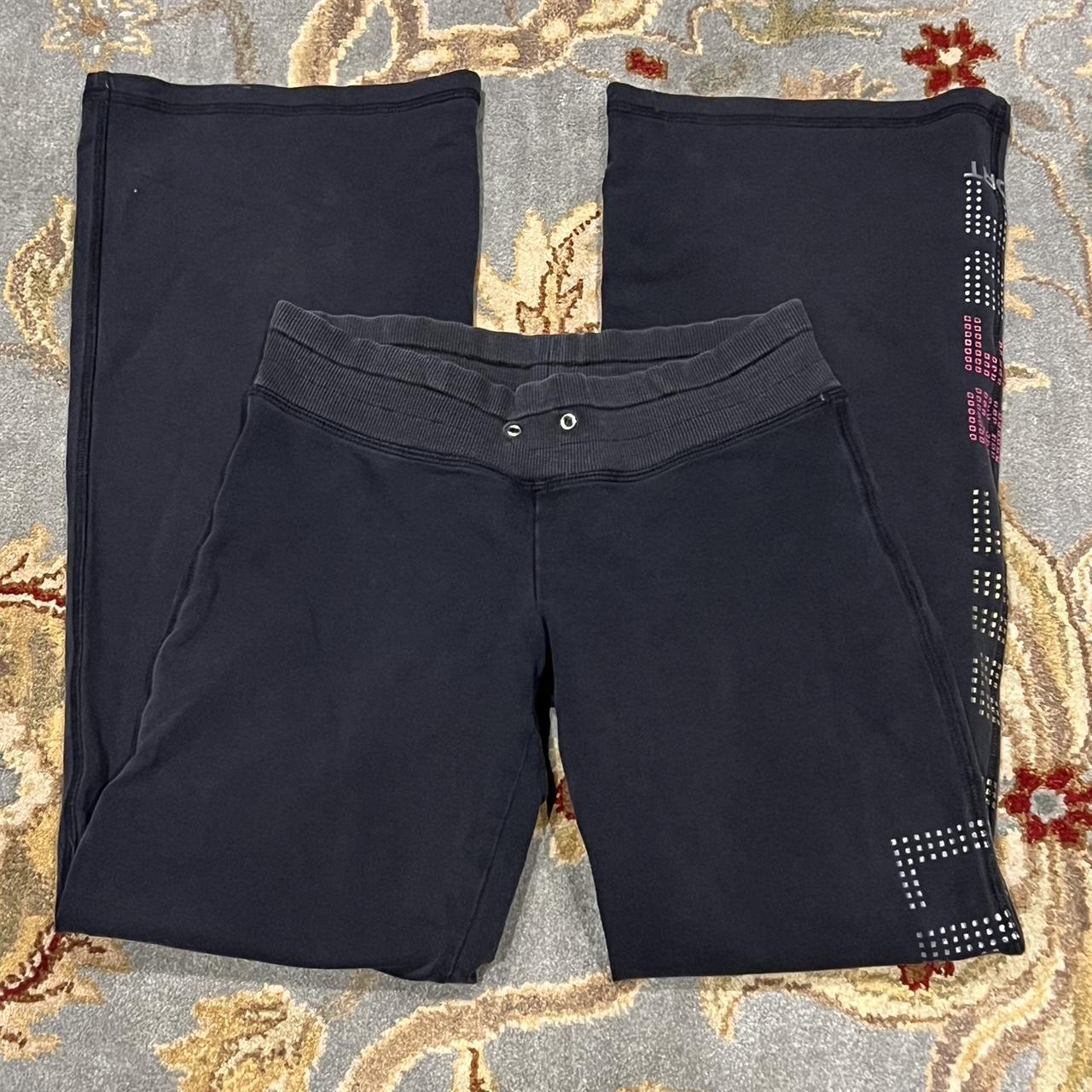 Bebe Sport black sweatpants size XS design on left... - Depop