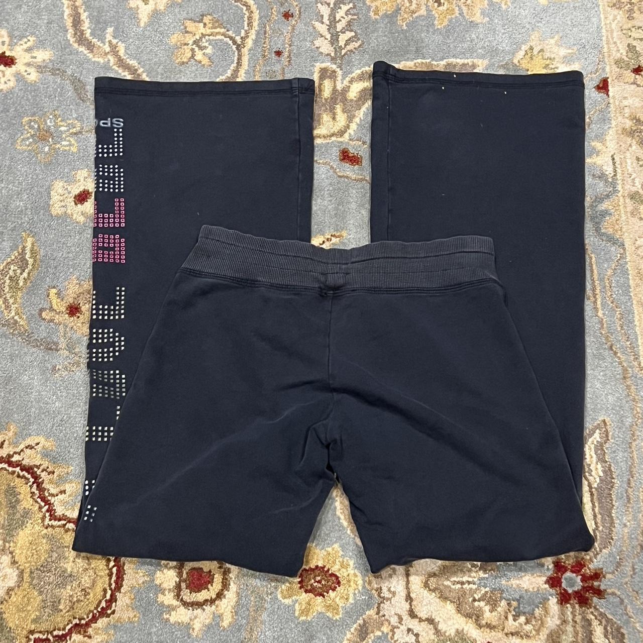 Bebe Sport black sweatpants size XS design on left... - Depop