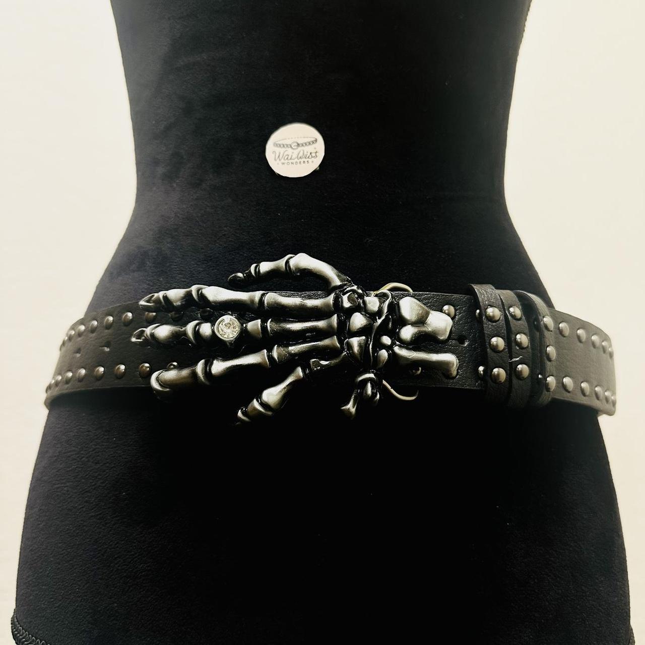 Skeleton hand belt with silver tone studs and... - Depop