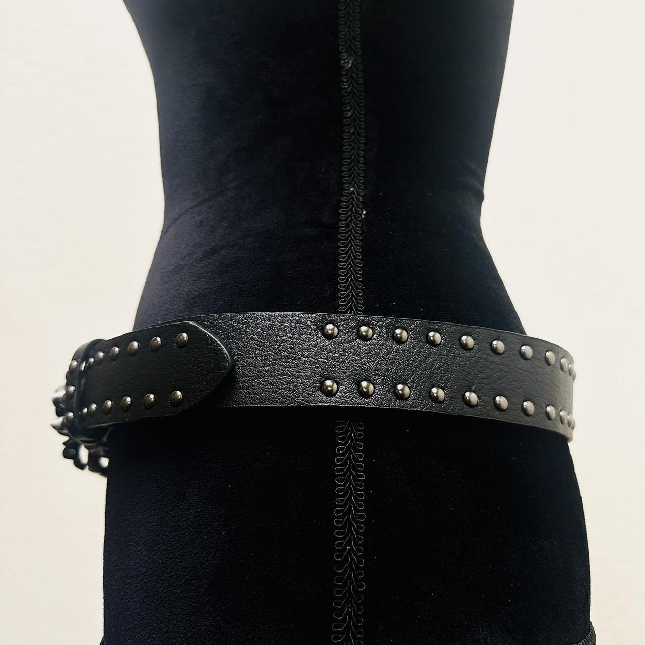 Skeleton hand belt with silver tone studs and... - Depop