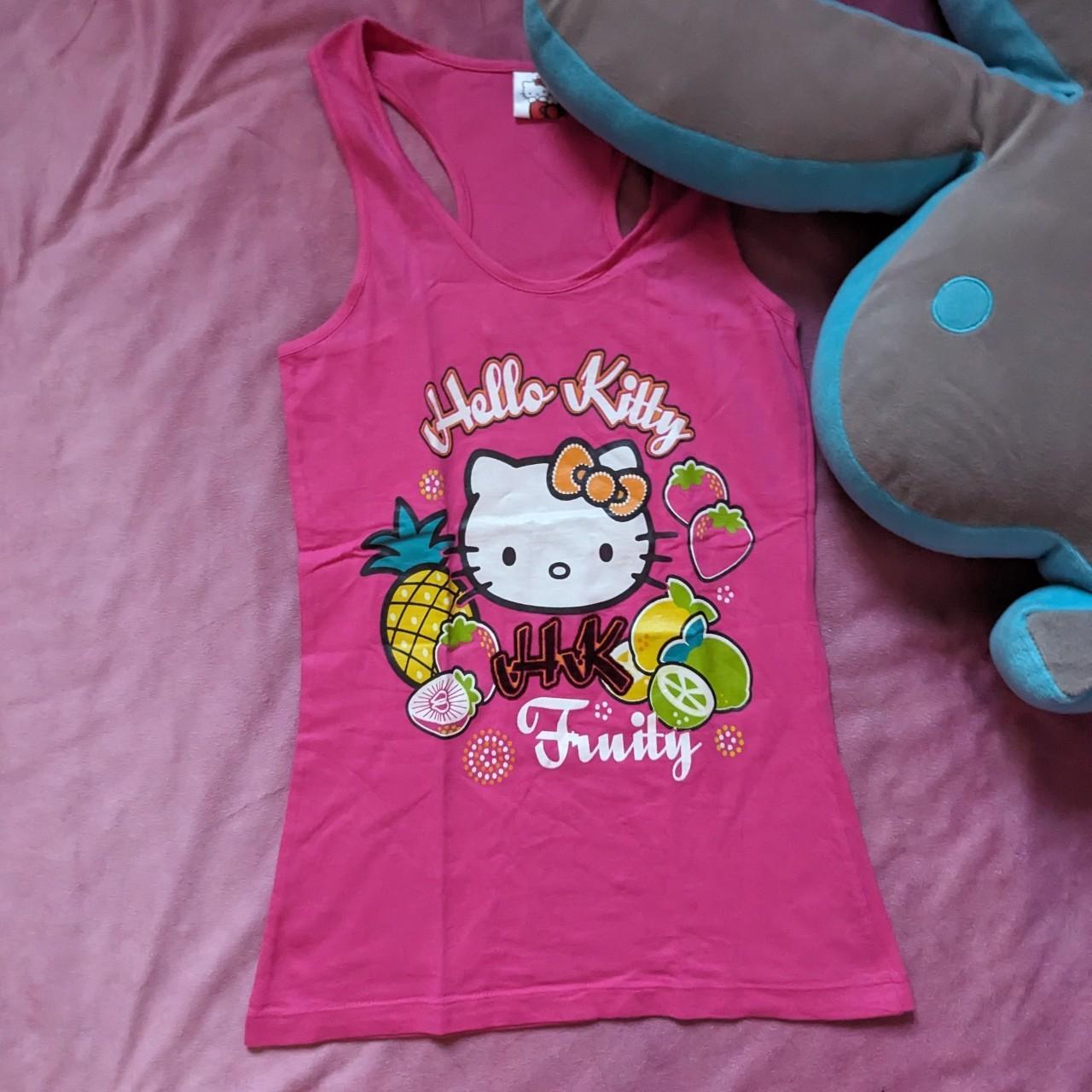 hello kitty tank top estimated small see ruler in... - Depop
