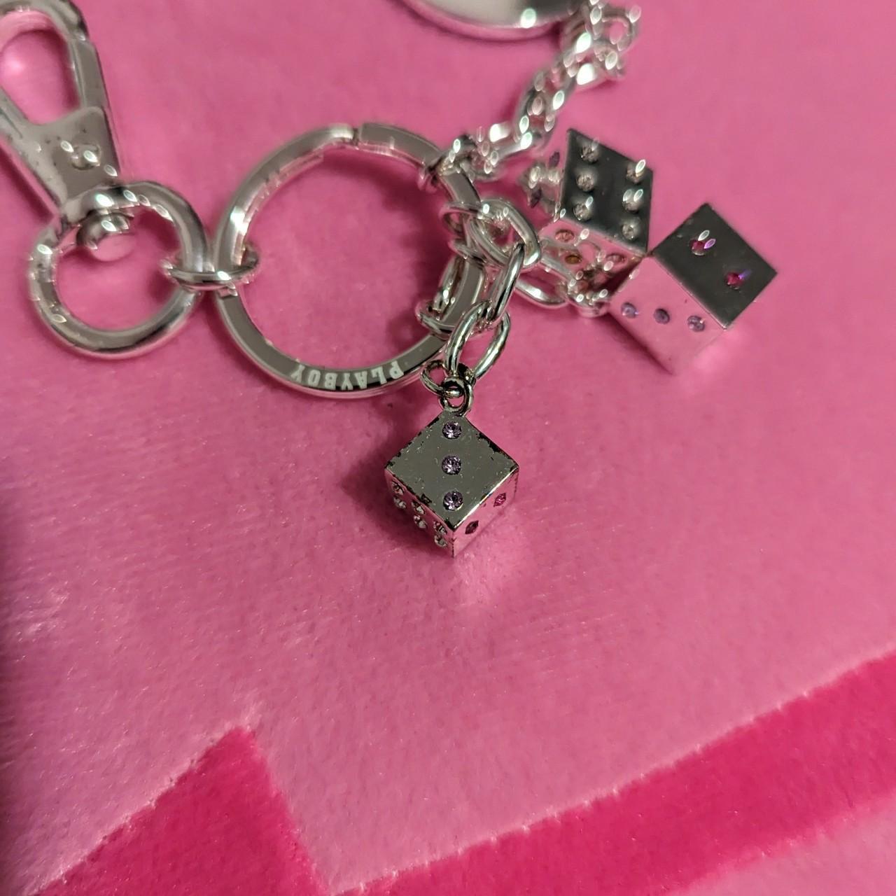 Roulette keychain with dice, there is some... - Depop