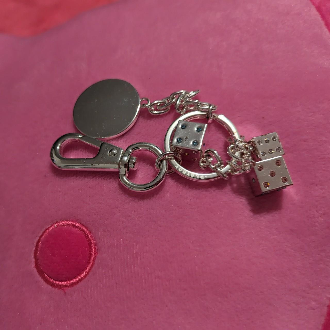 Roulette keychain with dice, there is some... - Depop