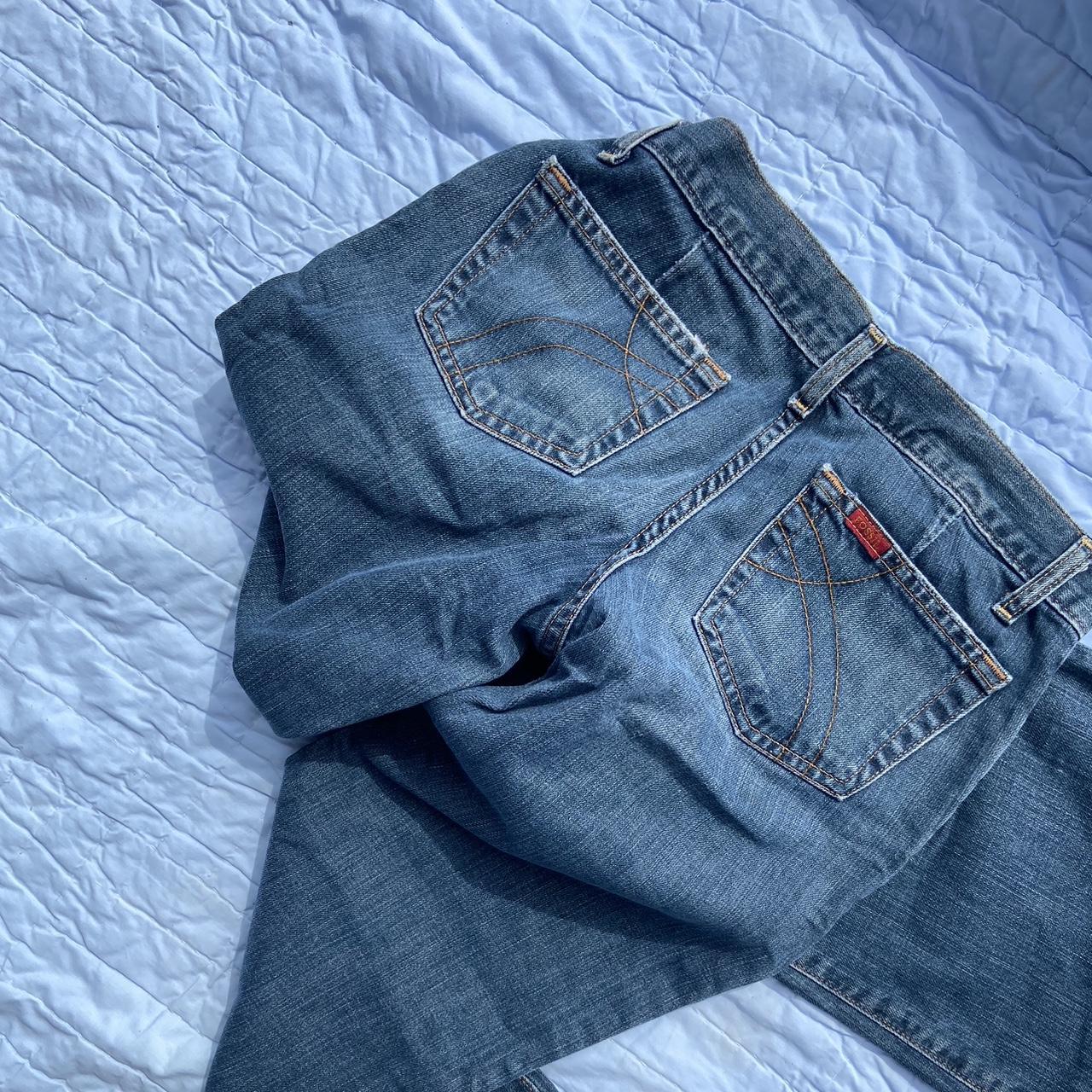 adorable boot cut jeans with red details LOWWW rise - Depop