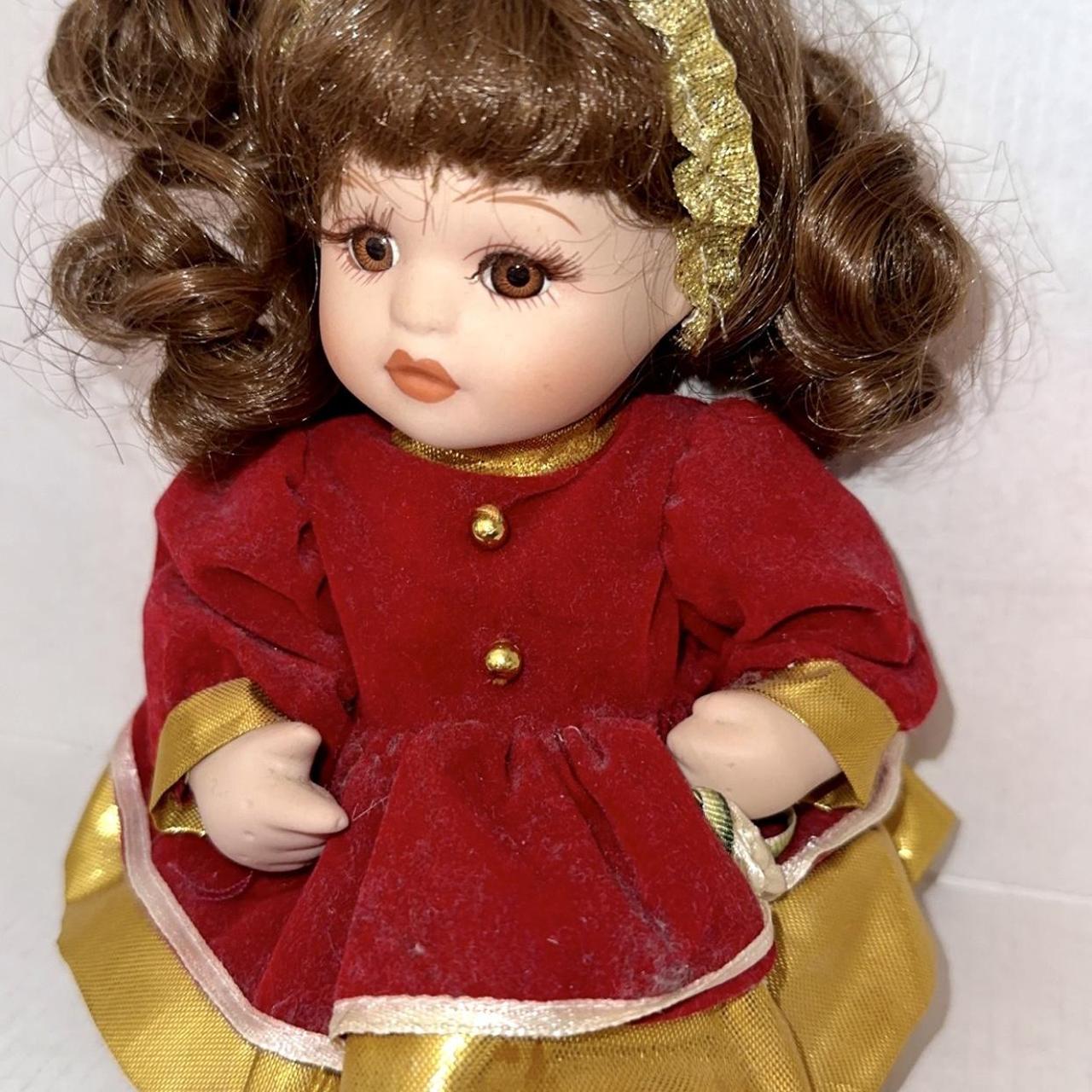 McField International Sitting Red Velvet Porcelain... - Depop