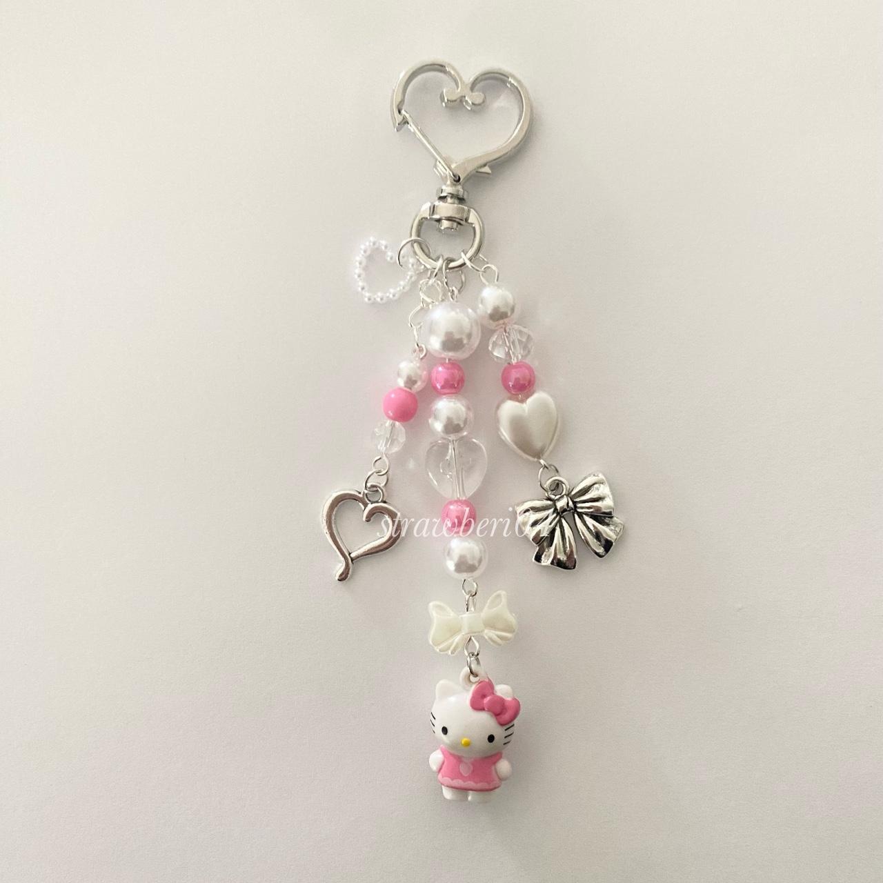 pink & white pearl beaded keychain with a pink hello... - Depop