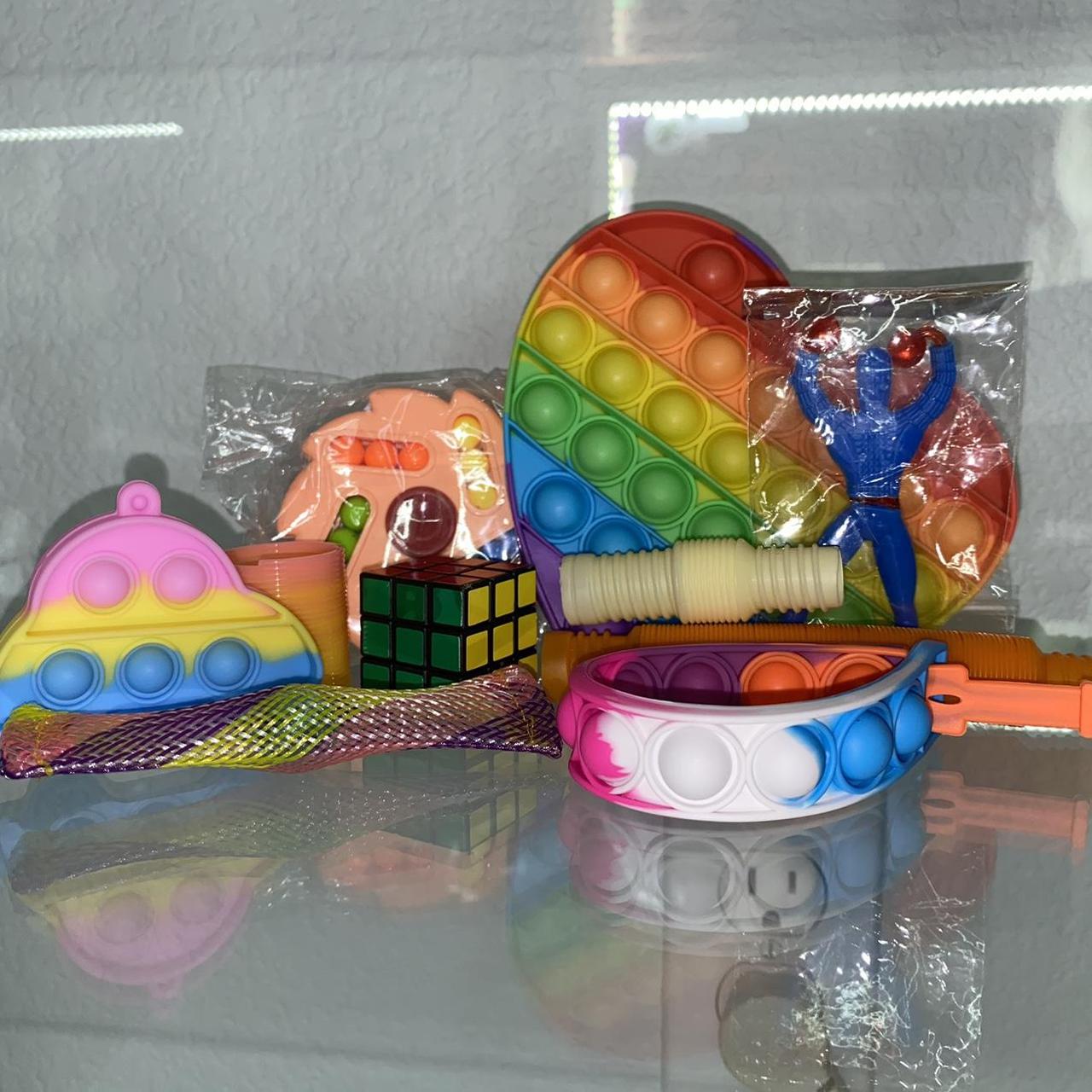 bundle of 10 fidget sensory toys, for education and... - Depop