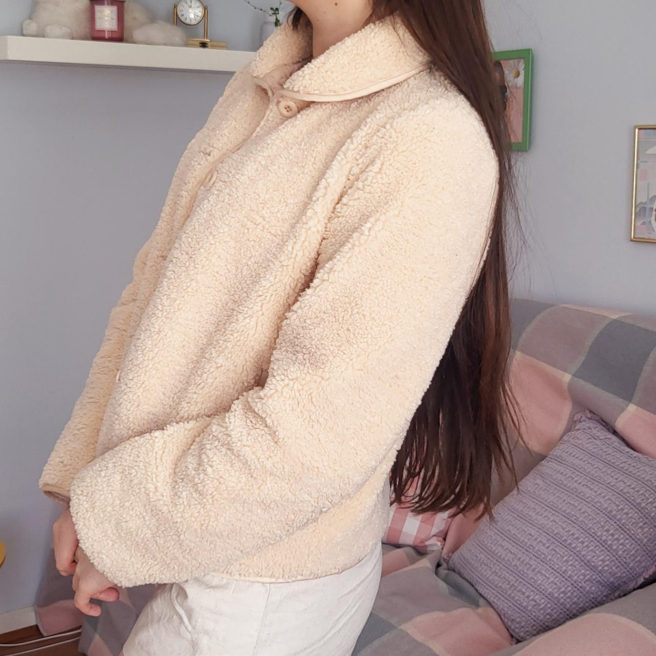 Cream teddy bear jacket. Features fluffy fabric with... - Depop