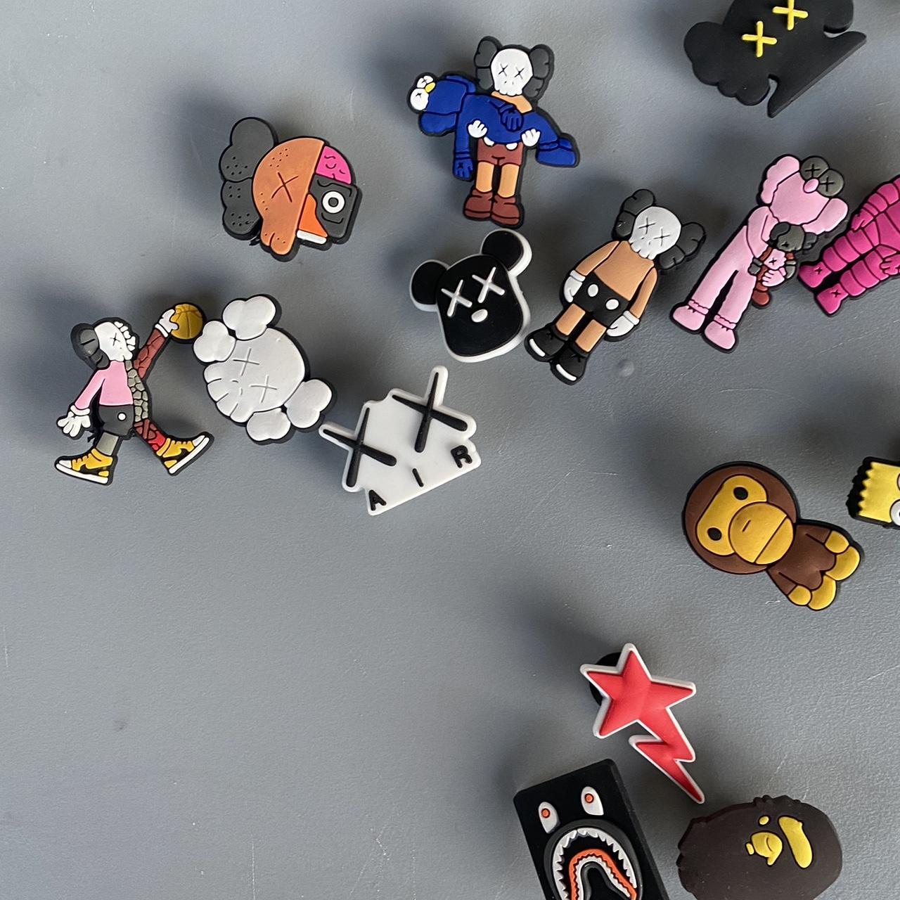 Kaws/bape charms Brand new Never used comes with... - Depop