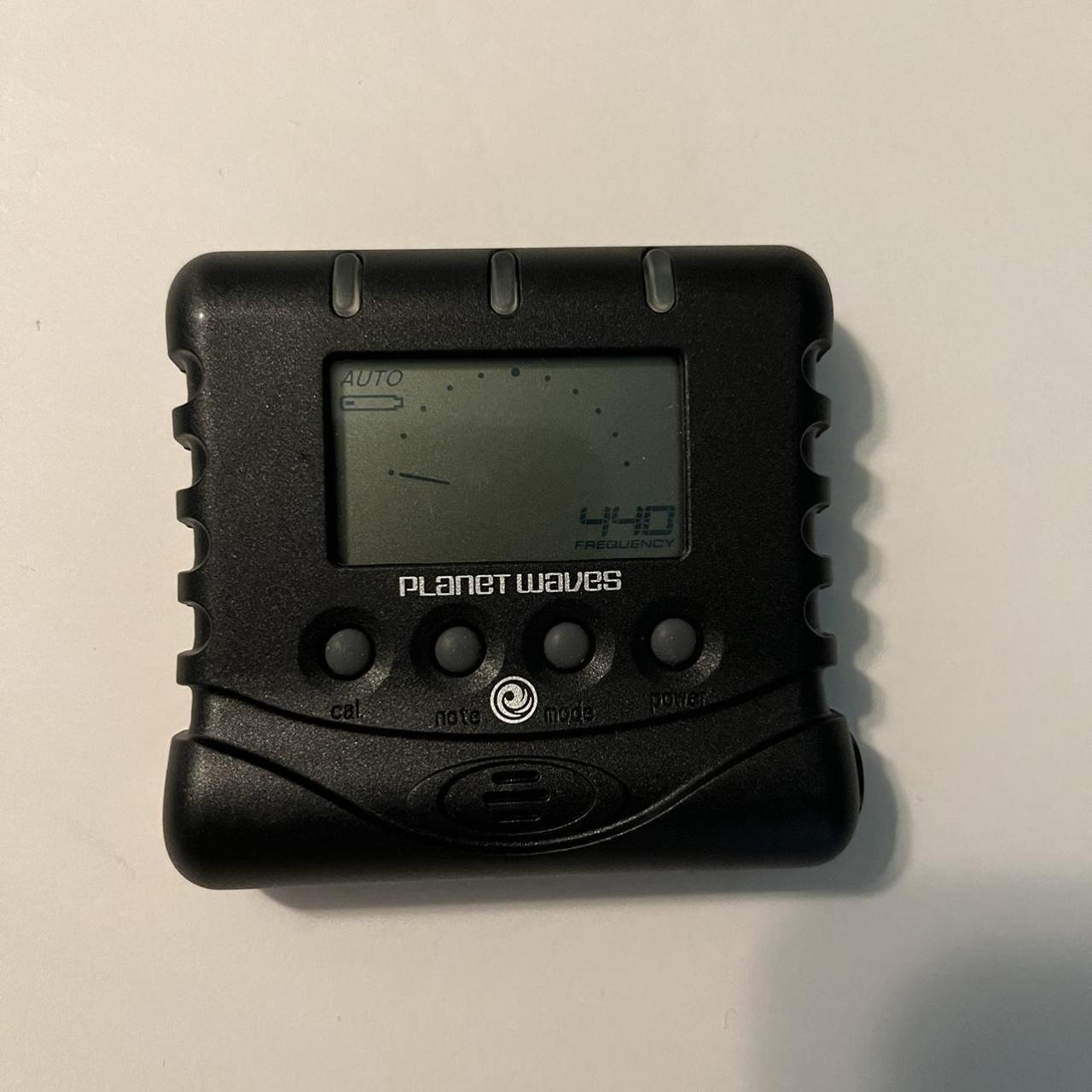 Universal instrument tuner. For guitars, bass,... - Depop